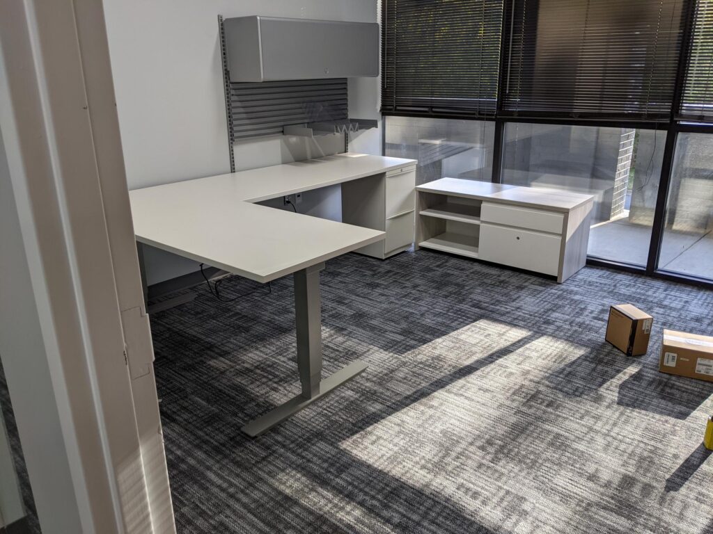 #607 L-Shaped Height Adjustable Desk - Office Solutions Inc